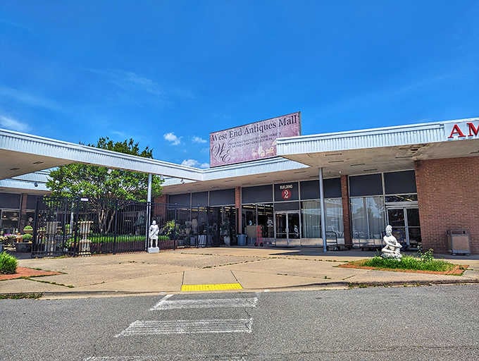 Trees frame this retro shopping plaza where multiple antique vendors create an endless maze of nostalgic finds and memories.