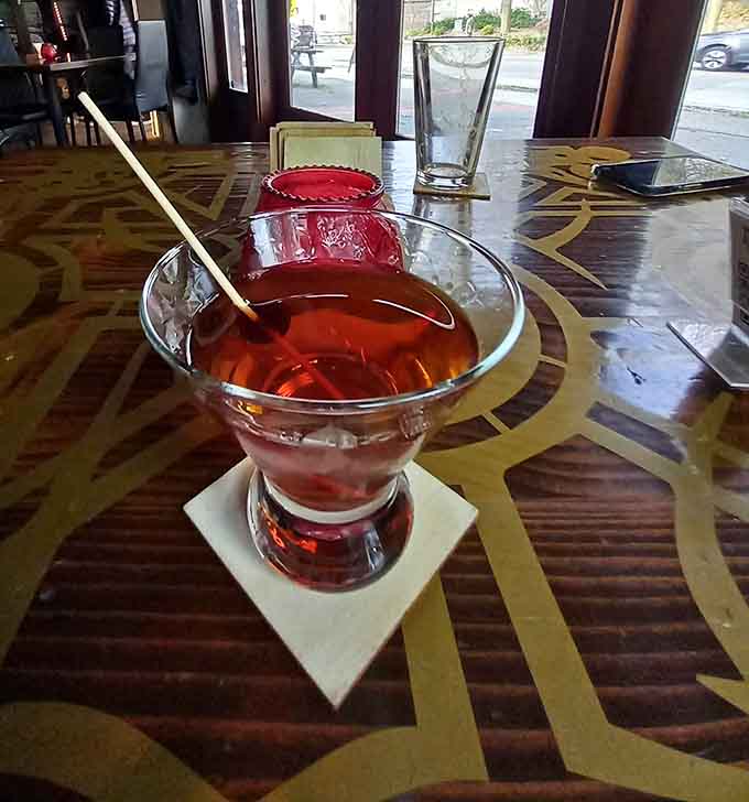 The Gordon Gekko Manhattan, deep red, perfectly chilled, and looking like it means serious business.