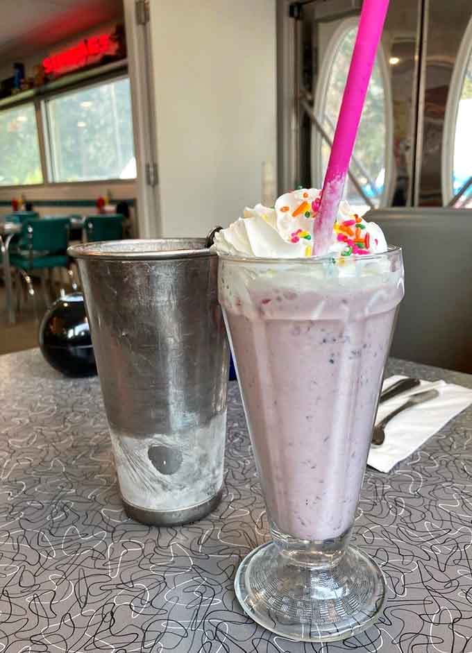That thick milkshake with whipped cream and sprinkles comes with extra in the metal cup, just like the good old days.