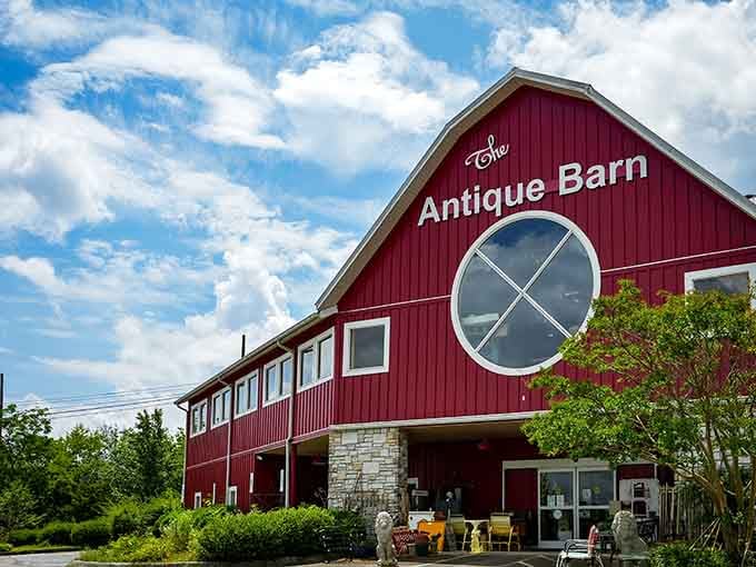 That classic red barn isn't housing livestock anymore, just treasures waiting for someone to love them again.