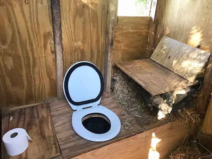 Even the bathroom embraces the rustic fantasy aesthetic, proving commitment to the hobbit lifestyle goes all in.