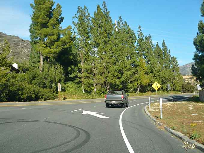 Tree-lined curves in suburbia mark the beginning, where civilization meets wilderness in perfect California fashion.
