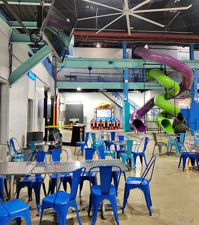 The seating area offers respite for exhausted parents watching their kids defy physics and common sense.