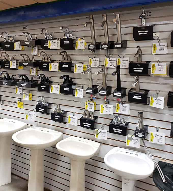 Bathroom faucets lined up like contestants on a game show, each one ready to upgrade your morning routine.