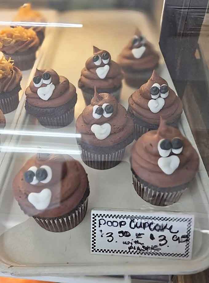 Yes, those are poop emoji cupcakes, because even bakeries have a sense of humor about bathroom jokes.