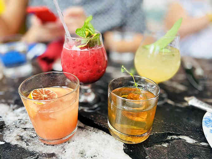 Four cocktails that look like they were mixed by artists who moonlight as bartenders, or possibly the other way around.