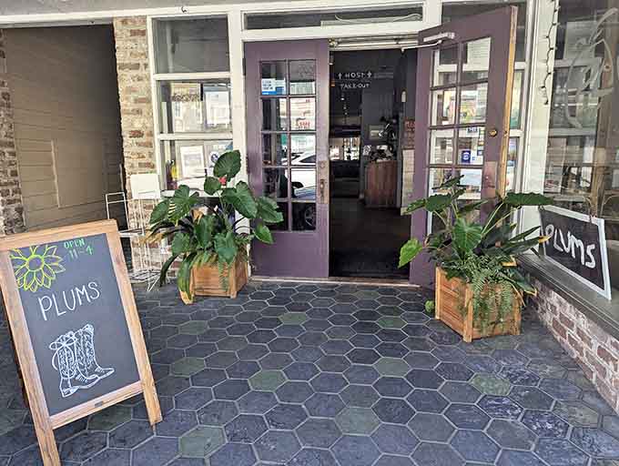 Purple doors and hexagonal tile floors signal that something delicious awaits beyond this welcoming Bay Street entrance.