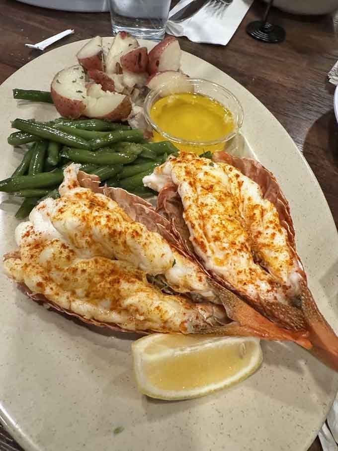 Perfectly broiled lobster tail flanked by crisp green beans and fluffy potato makes every day feel like a celebration.