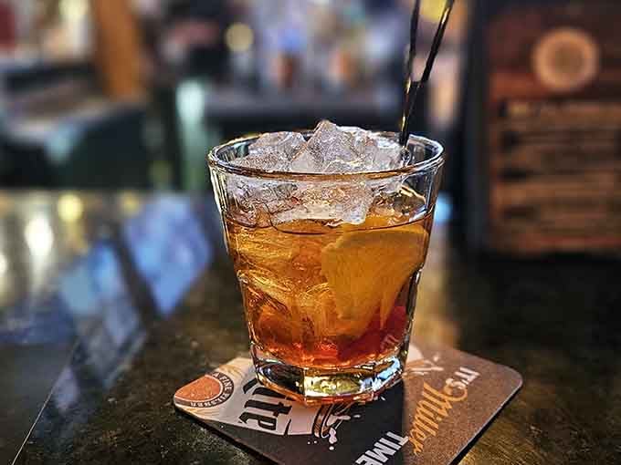 A proper cocktail on a branded coaster means someone here understands that details matter, even the small ones.