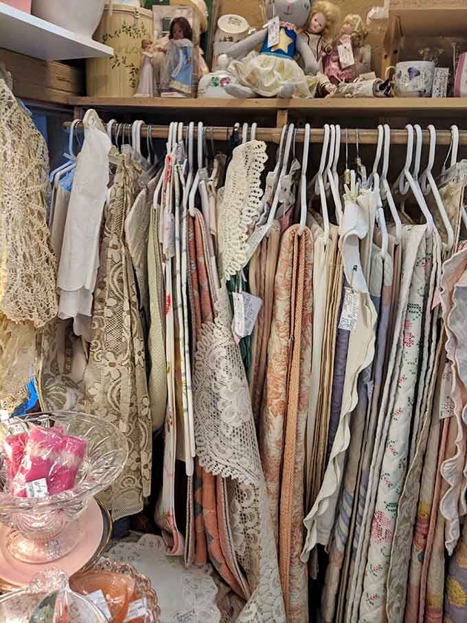 Delicate linens and lace pieces showcase the kind of craftsmanship that modern machines simply can't match.