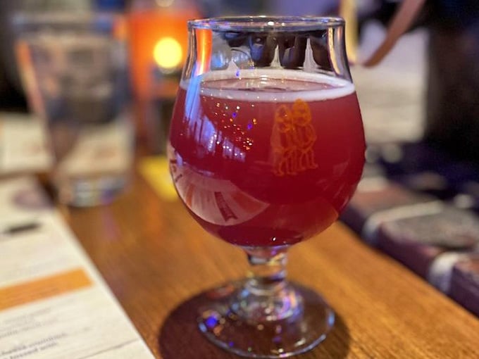 House-brewed beer in a proper glass, because some things deserve to be treated with respect and good lighting.