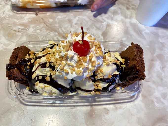 Brownies, ice cream, and enough toppings to make your dentist schedule an intervention, deliciously worth it.