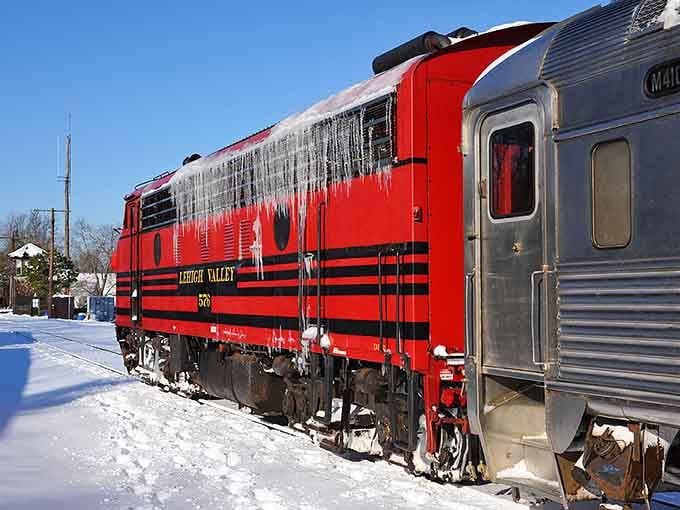 Winter rides offer their own stark beauty, with icicles adding dramatic flair to the vintage equipment.