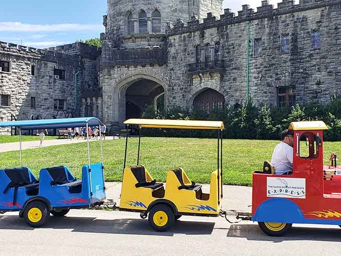 Nothing says "classy castle visit" quite like a miniature train ride that makes everyone smile like kids.