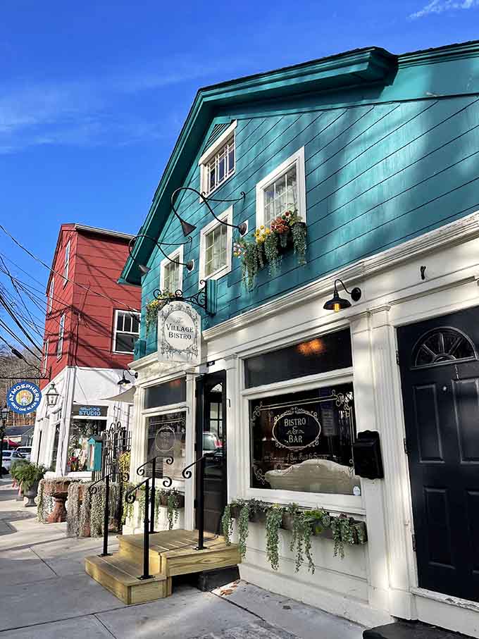 The Village Bistro's turquoise facade practically glows with the promise of good food and even better company.