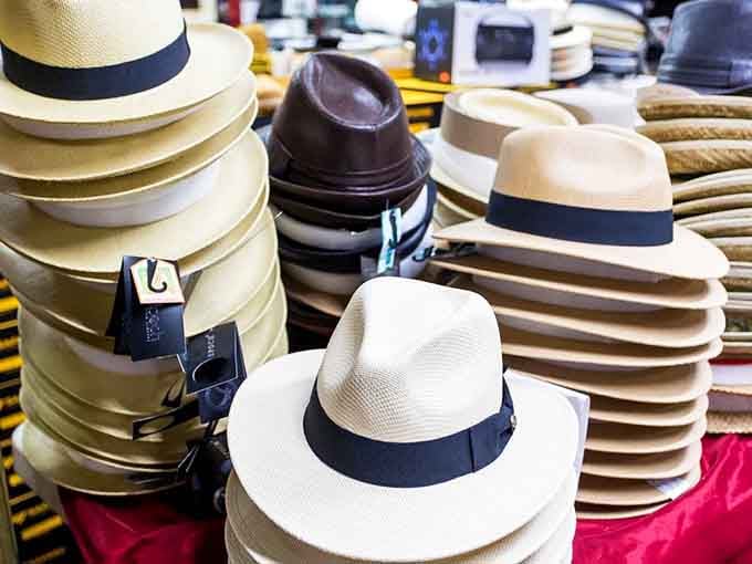 Stacks of classic hats waiting to transform you into someone who actually pulls off wearing hats, unlike most of us mere mortals.