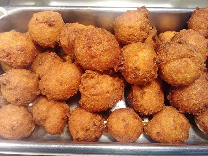 These golden hush puppies are basically cornbread's fun-loving cousin who knows how to party at the buffet line.