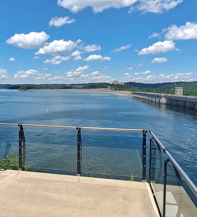 Glass railings frame panoramic lake views that'll make you forget you're technically still in a parking lot.