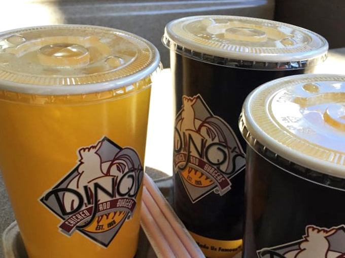 Those branded cups hold refreshing beverages that perfectly complement your chicken feast on a warm California afternoon.