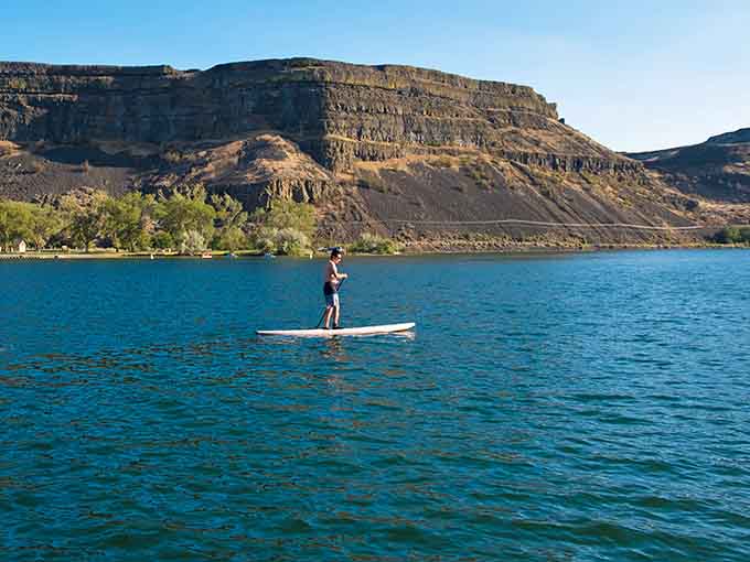 Paddleboarding where ten times Earth's rivers once thundered past feels delightfully ironic and wonderfully peaceful.