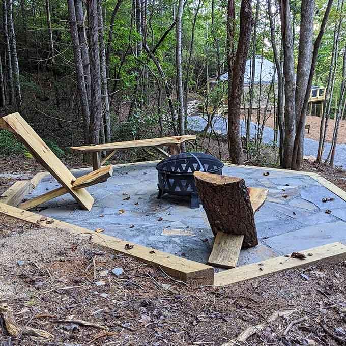 Your personal fire pit area comes with handcrafted seating because s'mores taste better when you're sitting on art.