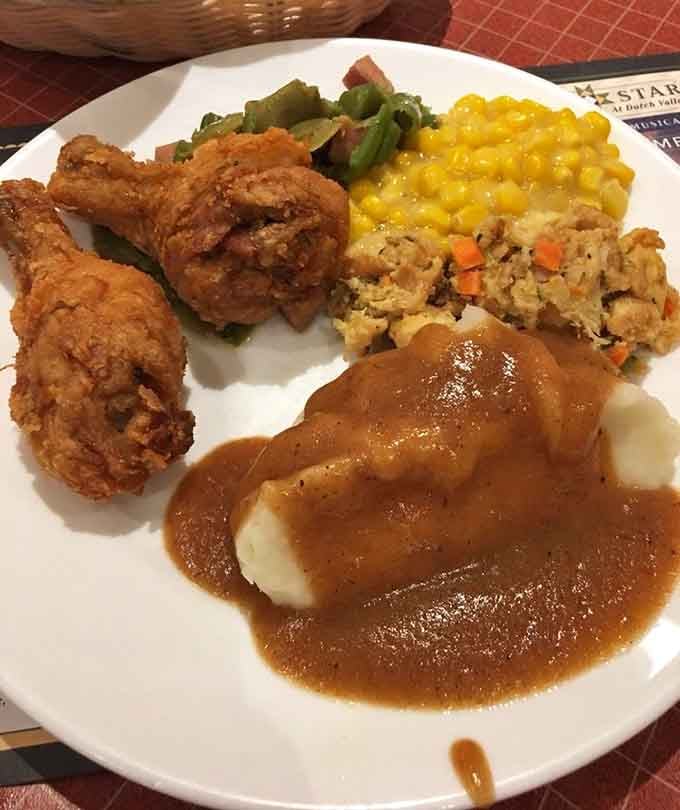 Golden fried chicken alongside mashed potatoes and corn proves that comfort food doesn't need a fancy pedigree.