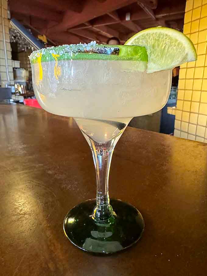 This margarita sits prettier than most Instagram influencers and tastes infinitely better than any filter could suggest.