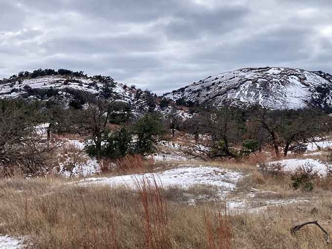 Winter transforms the rock into a frosted masterpiece that looks like nature's own powdered donut.