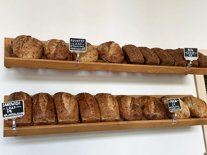Farm Club bakes their own bread daily, displayed like edible art that'll make your sandwich dreams come true instantly.