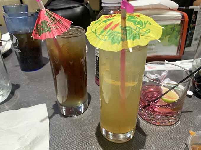 Those colorful cocktails with tiny umbrellas are proof that adults deserve fun drinks too, fancy straws included.
