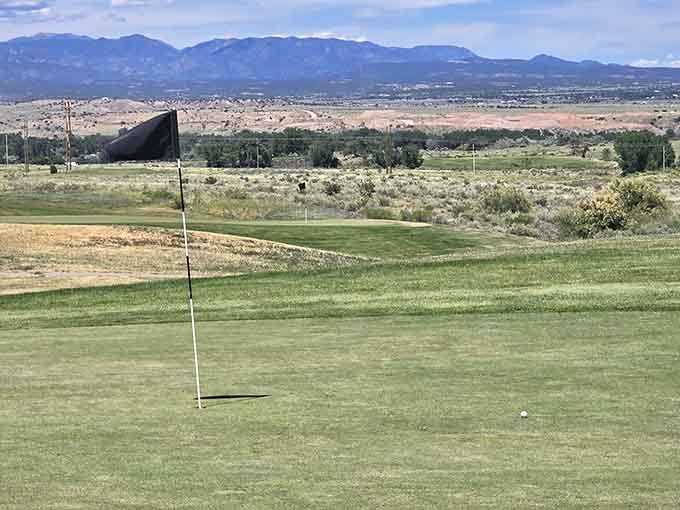 Mountain views frame the fairways where you can work on your swing between antique shopping sessions, because balance is everything.