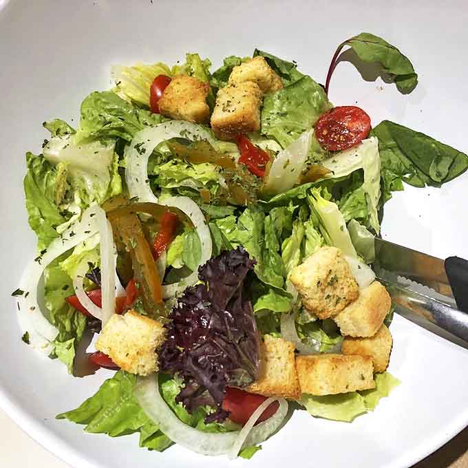 Even the salads here come with generous portions and homemade croutons that actually taste like something special.