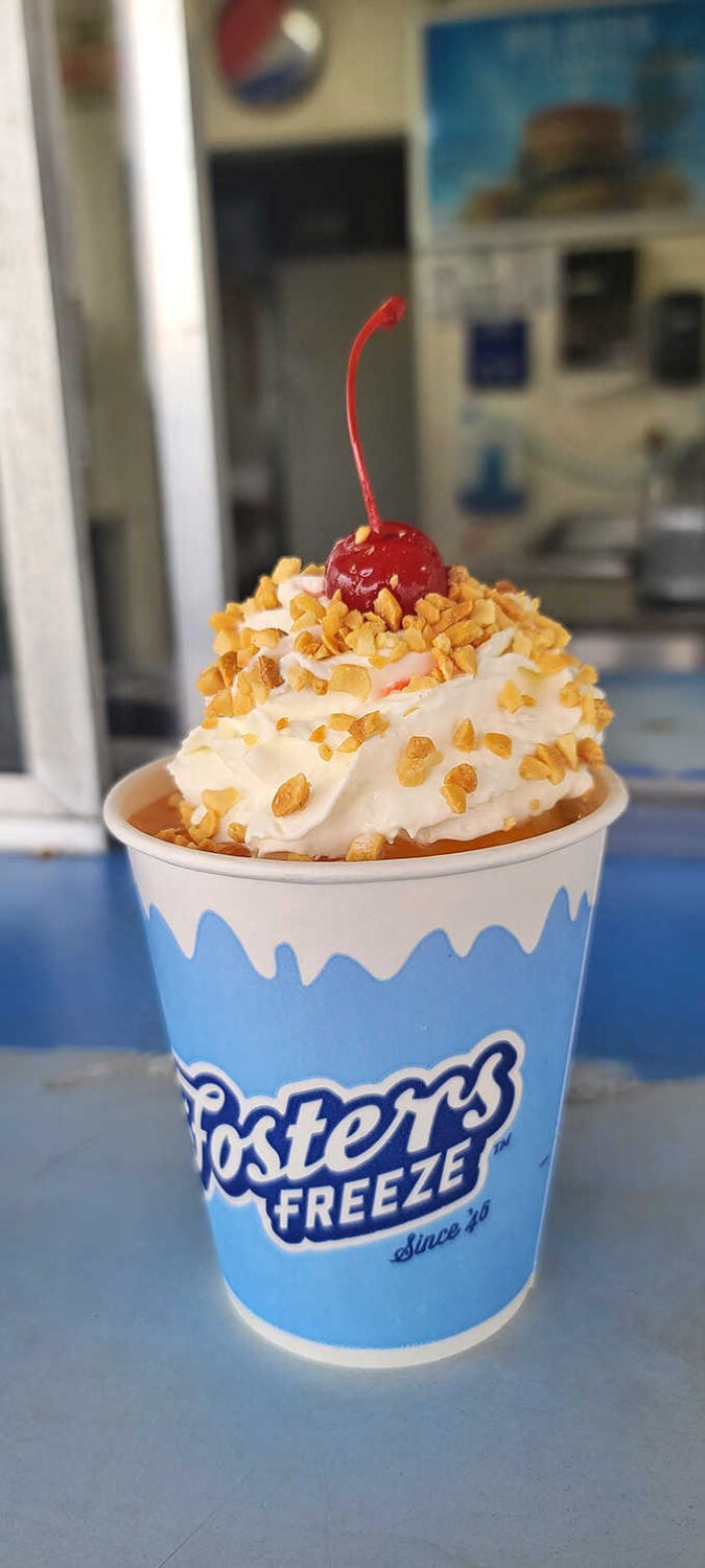Butterfinger pieces scattered throughout transform ordinary soft-serve into a crunchy, creamy adventure worth every calorie you'll happily consume.