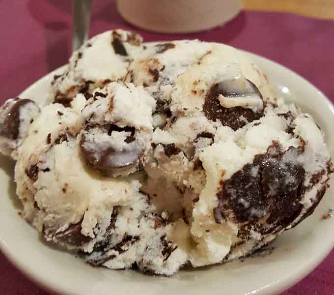 Ice cream loaded with enough toppings to qualify as a full meal, which is convenient since you're already full.