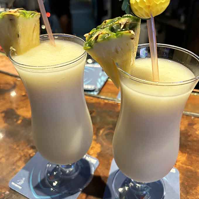 Tropical drinks with pineapple garnishes transport you somewhere warm, even when Boston weather has other plans for you.