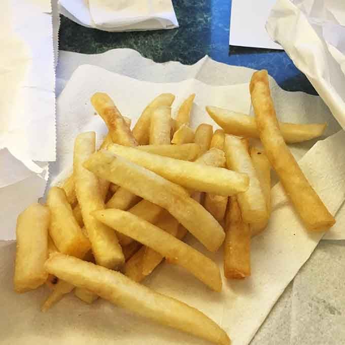 Golden fries that serve as the perfect savory prelude to your inevitable custard-based main event.