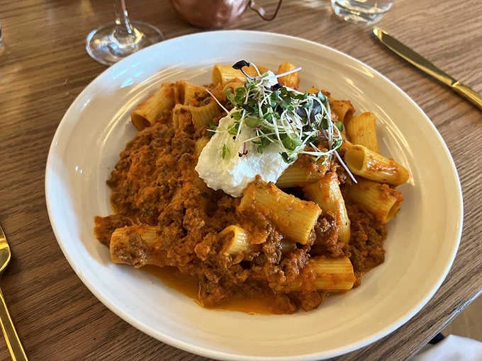 Rigatoni Bolognese made fresh daily, because some things are worth the extra effort in the kitchen.