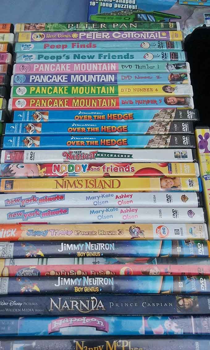 Stacks of DVDs bring back memories of Blockbuster nights, now available for less than your morning coffee habit.