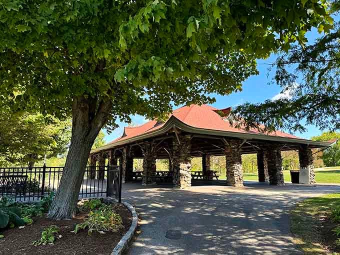 This stone pavilion with its distinctive architecture provides shelter and character, like something from a classic New England postcard come alive.