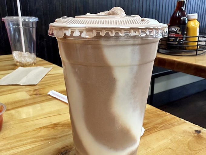 That milkshake's so thick it probably needs a construction permit, and your biceps will thank you for the workout.