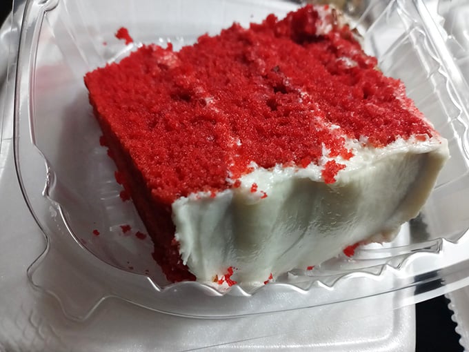 Red velvet cake with cream cheese frosting: the sweet ending that makes you forget you're already uncomfortably full.
