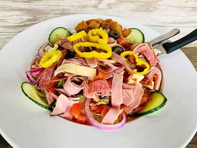 This isn't your sad desk lunch salad; it's a colorful mountain of fresh ingredients that actually looks appetizing and filling.