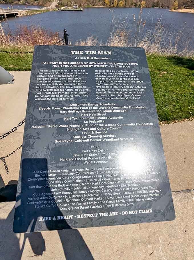 The plaque tells the whole story, because every great roadside attraction deserves proper documentation and community recognition.