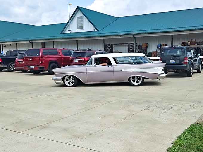 Even the parking lot delivers nostalgia when a pristine classic car rolls up alongside modern SUVs seeking treasures.