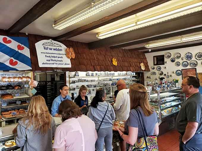 The crowd knows what's up, and what's up is getting their hands on these pastries before sellout.