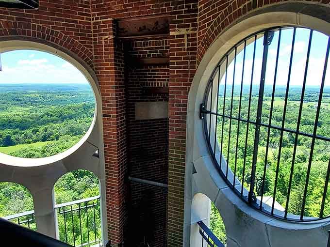 Those circular windows frame the landscape like nature's own IMAX theater, minus the overpriced popcorn and sticky floors.