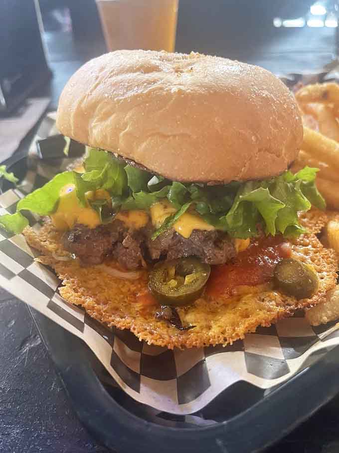This burger sits on a fried cheese bun because regular buns are for people with self-control.