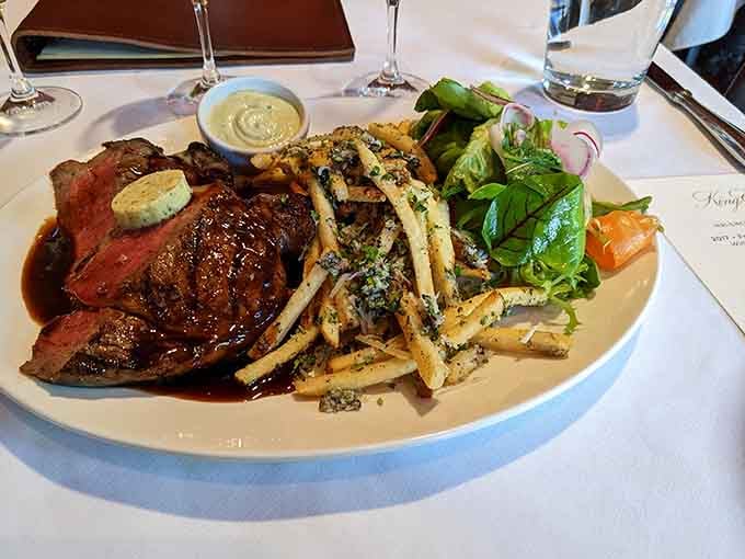 Perfectly seared beef with herb-flecked fries looks like something worth canceling your dinner plans for at home.