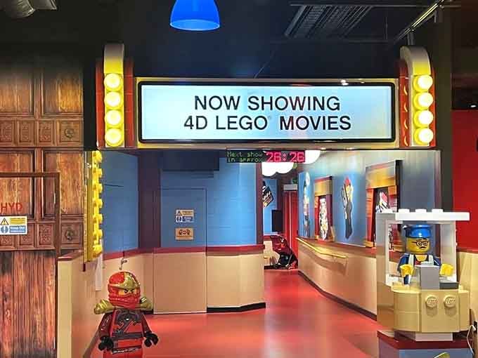 The cinema marquee promises 4D adventures where wind and mist make movies leap beyond the screen.