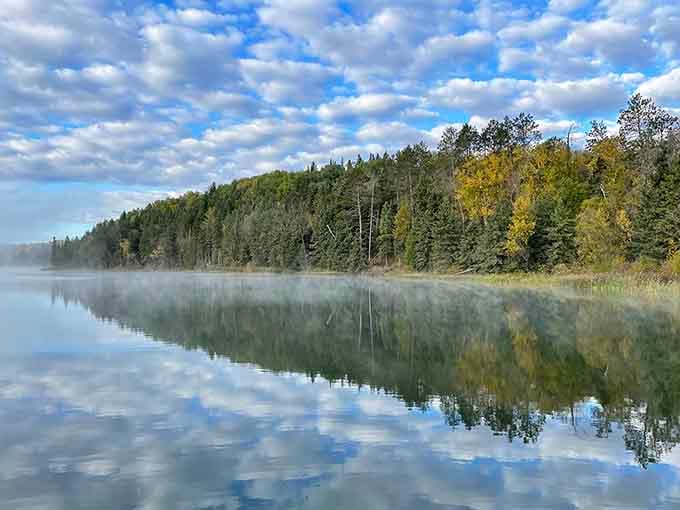 When the water mirrors the sky this perfectly, you're looking at nature's own Rorschach test of tranquility.
